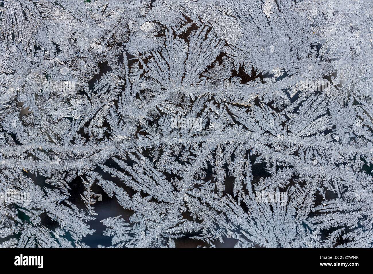 Gorgeous view through frozen window. Beautiful winter background ...