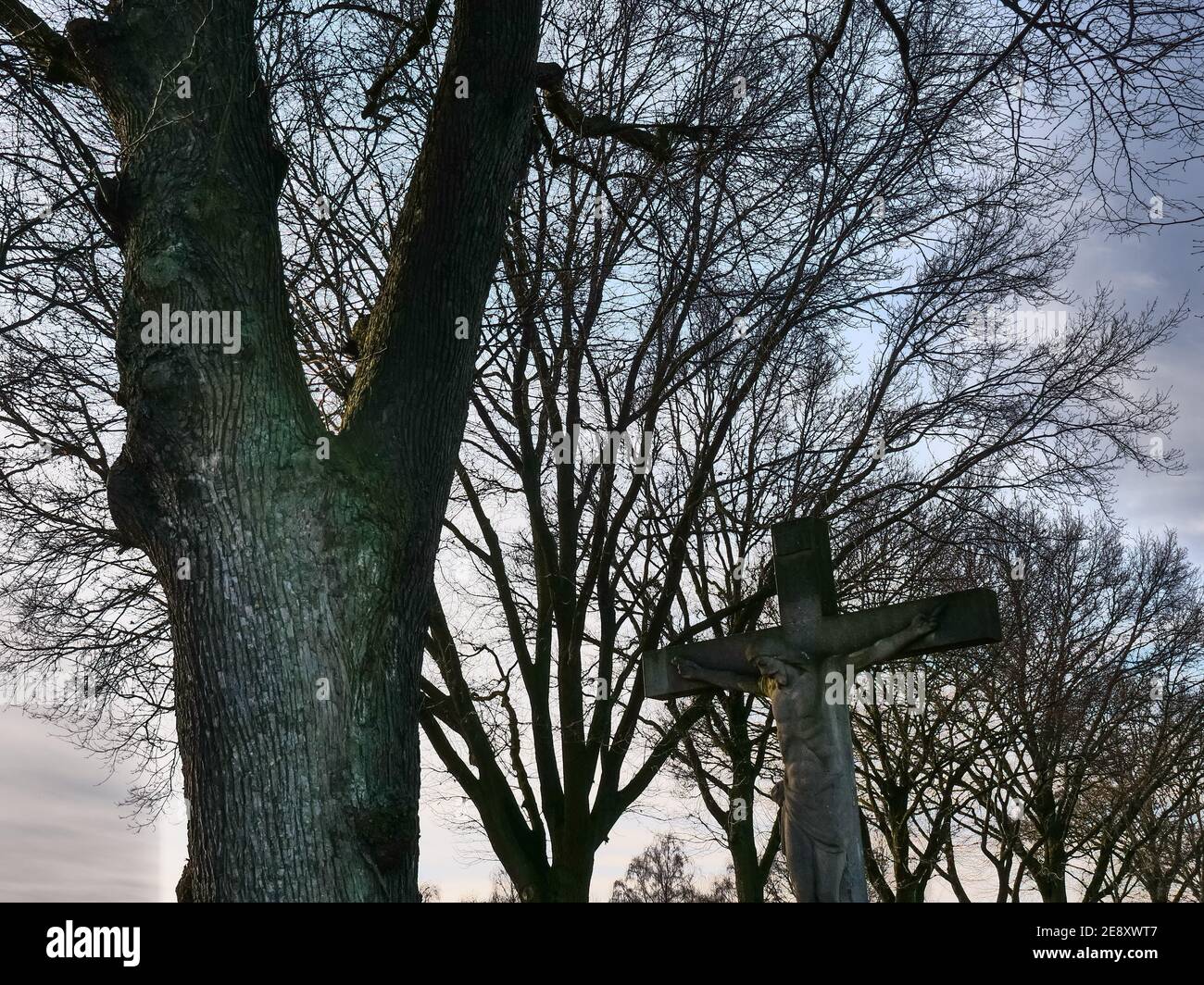 religious cross and trees in germany Stock Photo - Alamy