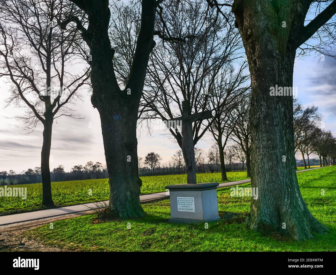 religious cross and trees in germany Stock Photo - Alamy