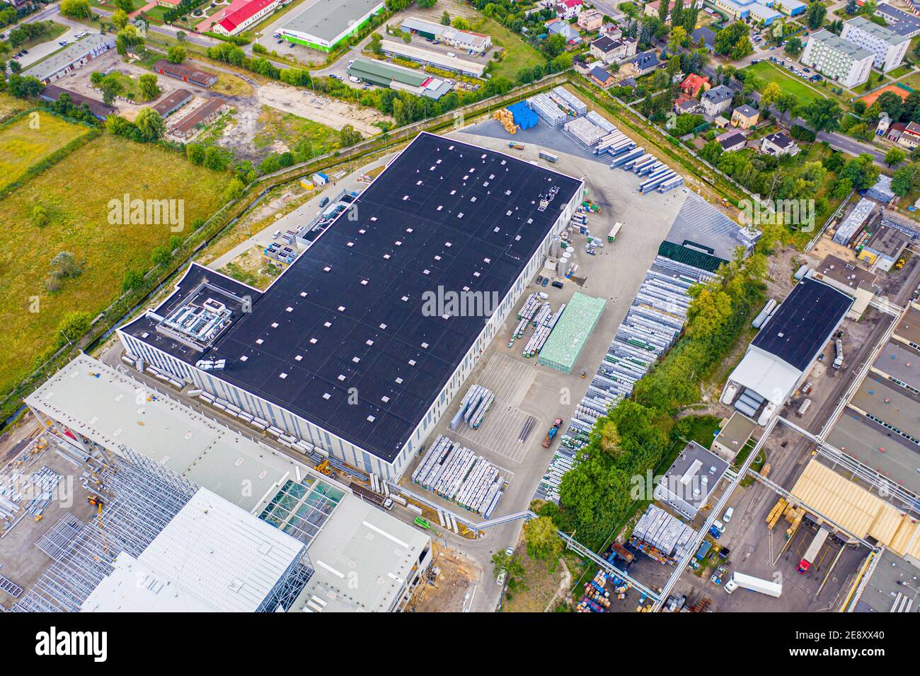 Aerial view of goods warehouse. Logistics delivery center in industrial ...
