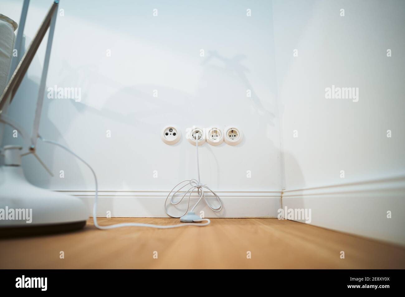 electricity socket on a white wall in the house Stock Photo - Alamy