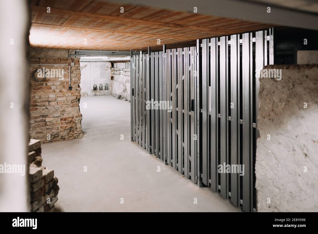 photo of the inside of secure basement metal units Stock Photo - Alamy