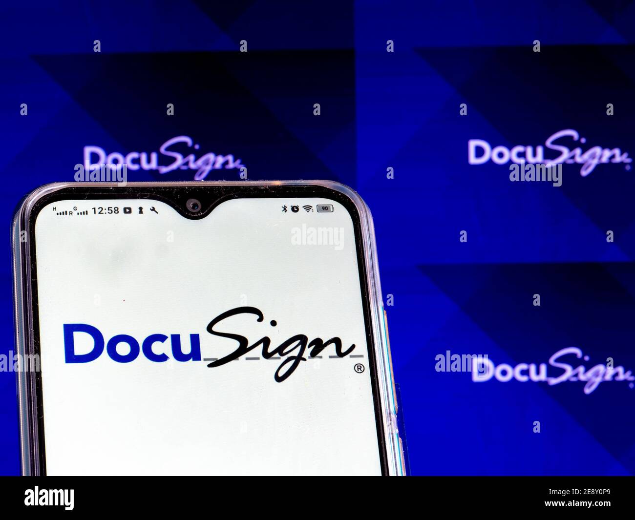 In this photo illustration a DocuSign, Inc. logo is seen displayed on a ...