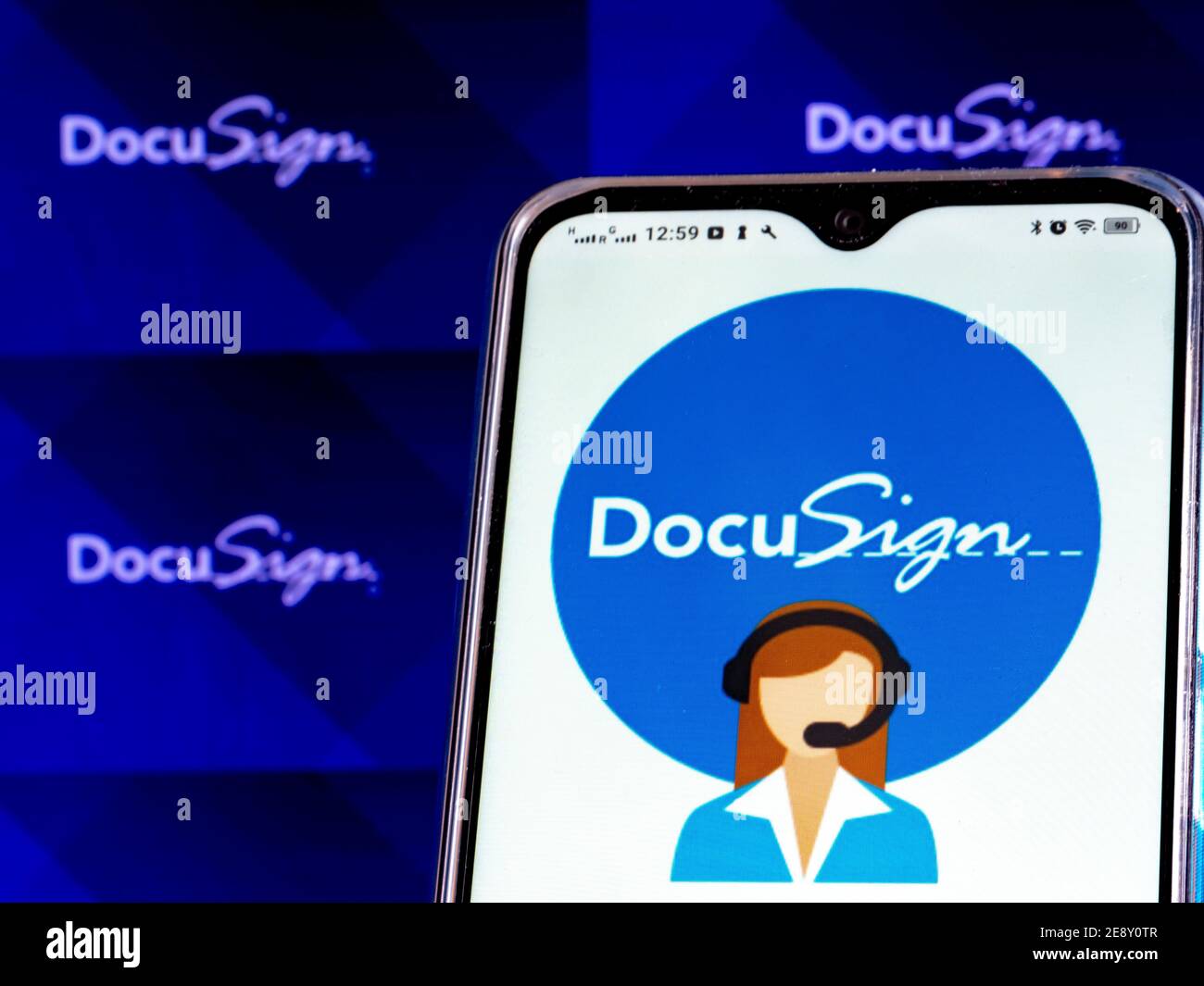 In this photo illustration a DocuSign, Inc. logo is seen displayed on a ...