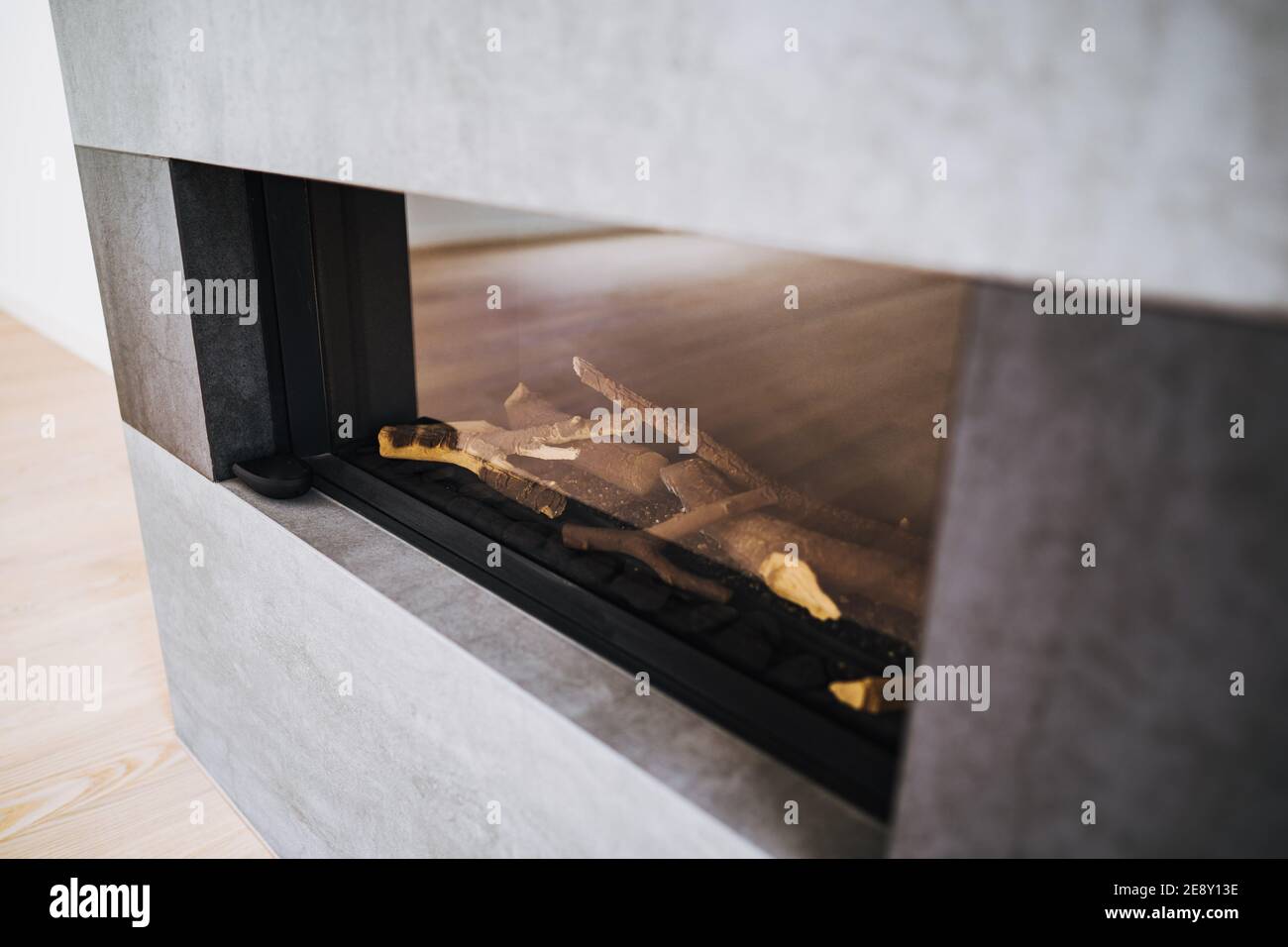 photo of a modern fire place close up Stock Photo - Alamy