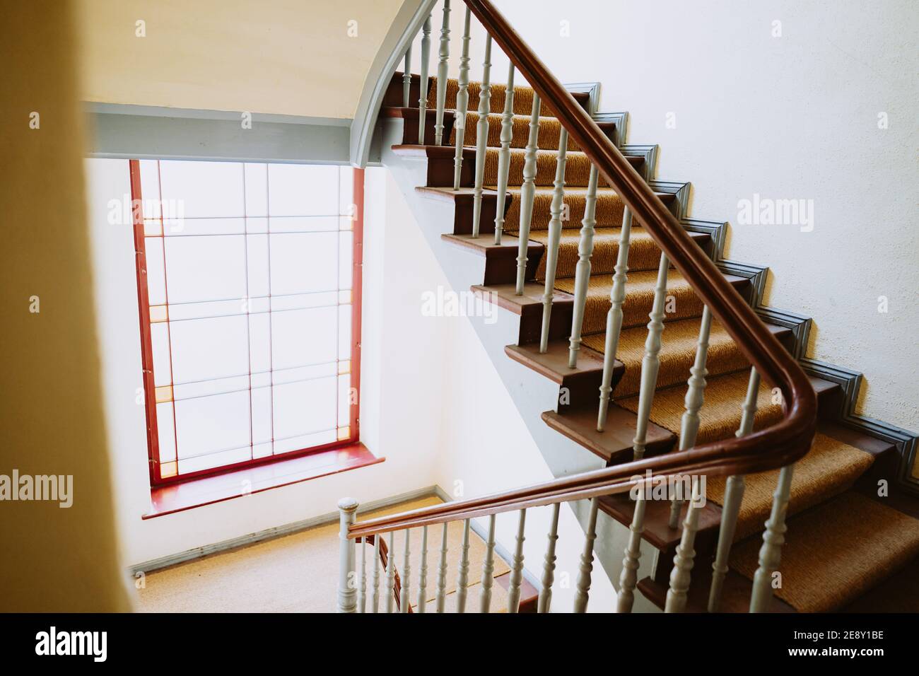 a photo of an old building staircase view Stock Photo - Alamy