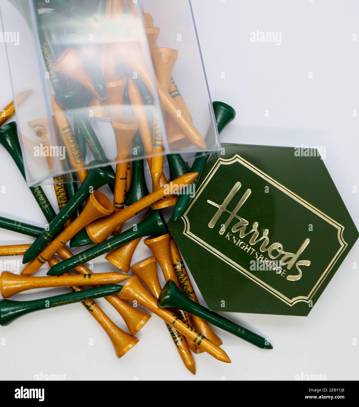 Photo of a Gift box of natural varnished wood and green painted golf ...