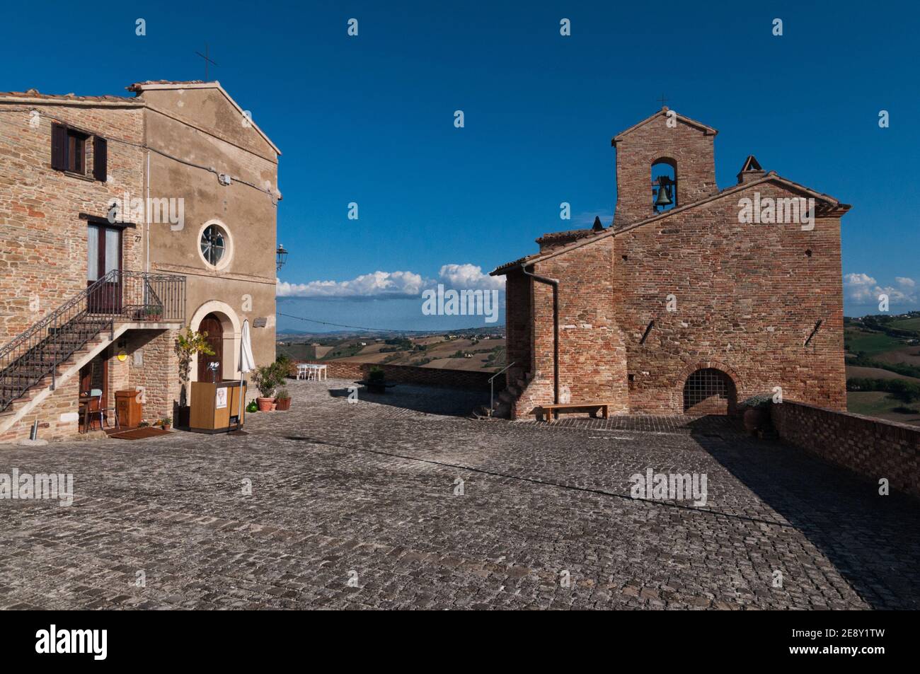 Two medieval churches next to each other with beautiful landscape on ...