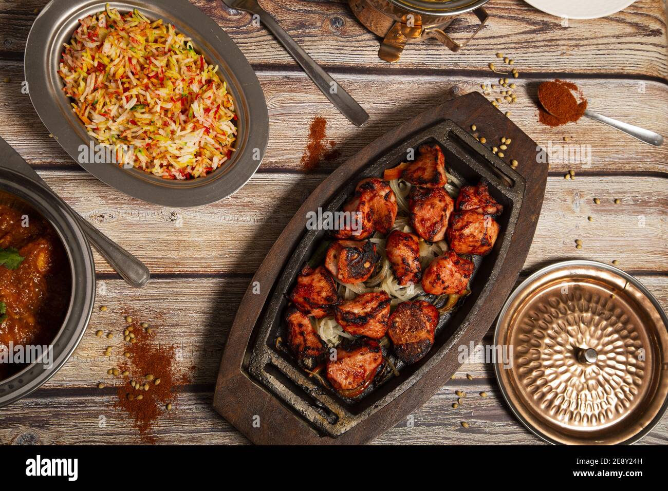 Top view of deliciously seasoned and prepared Tandoori chicken, Indian ...
