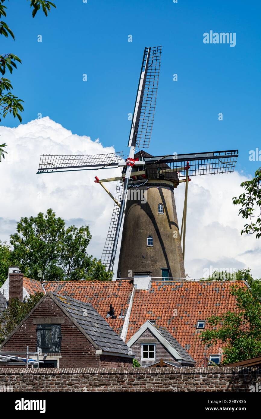 Old Dutch windmill in little ancient town with big history Buren ...