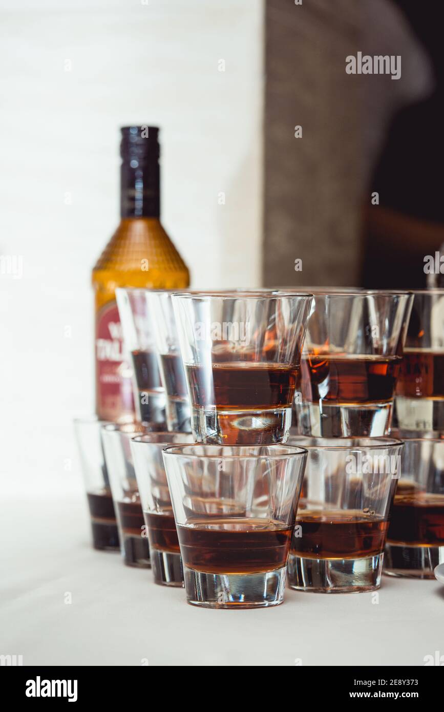 Pyramid of glasses of alcohol made in a pyramid for event party or ...