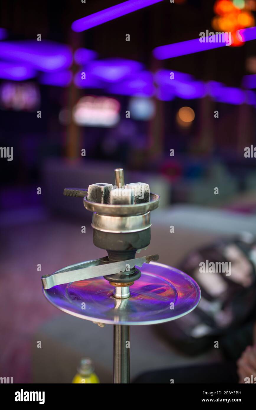 Vertical shot of a hookah with steaming charcoal in a bar Stock Photo ...