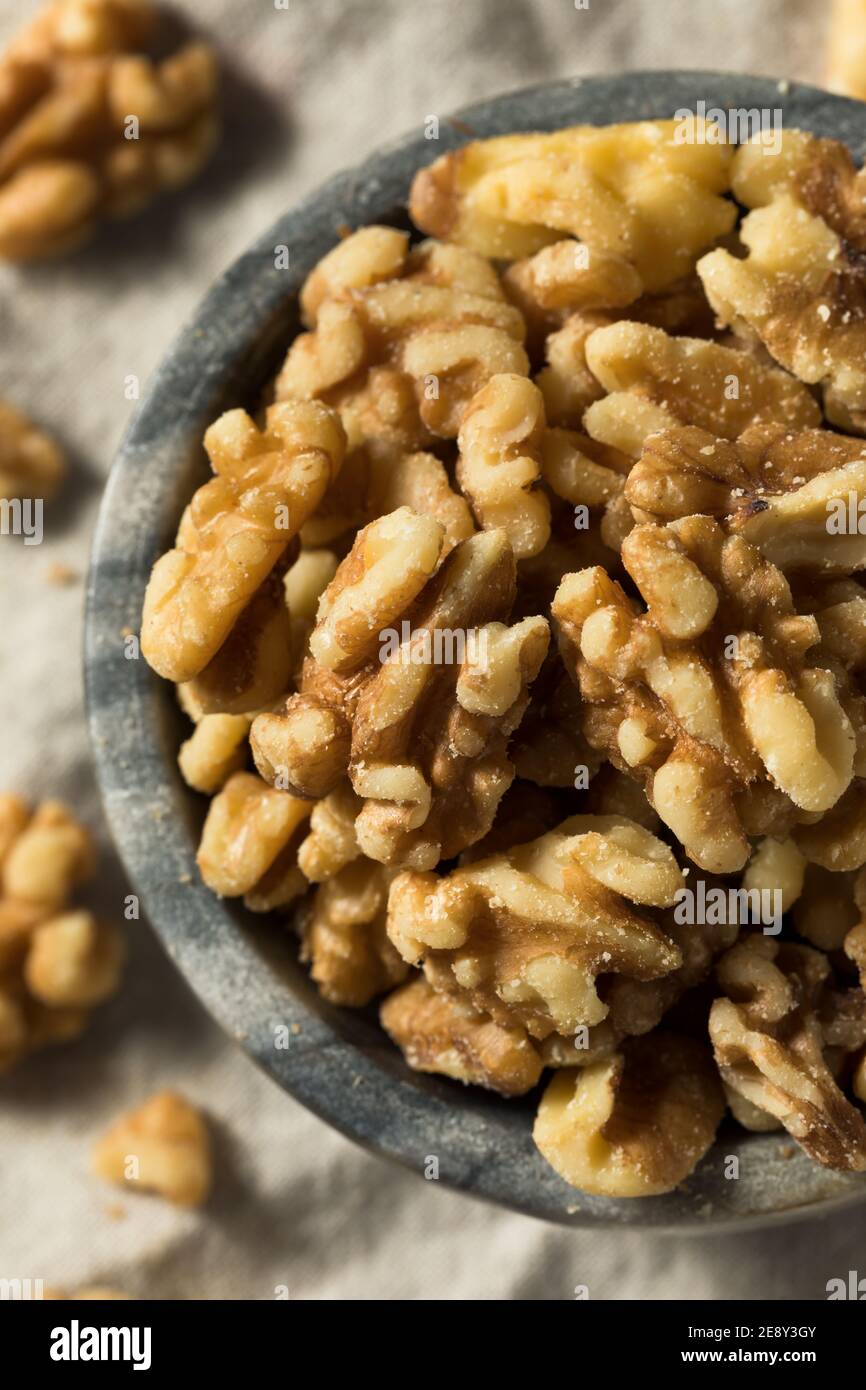 Raw Organic Shelled Walnuts in a Bowl Stock Photo - Alamy