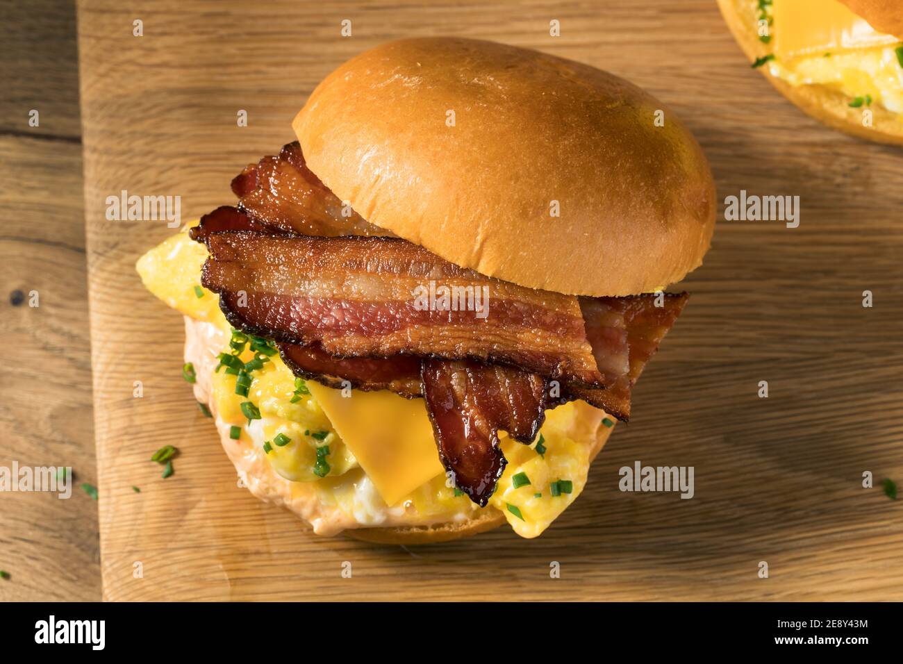 Homemade Bacon Egg Sandwich on a Brioche Bun with Cheese Stock Photo ...