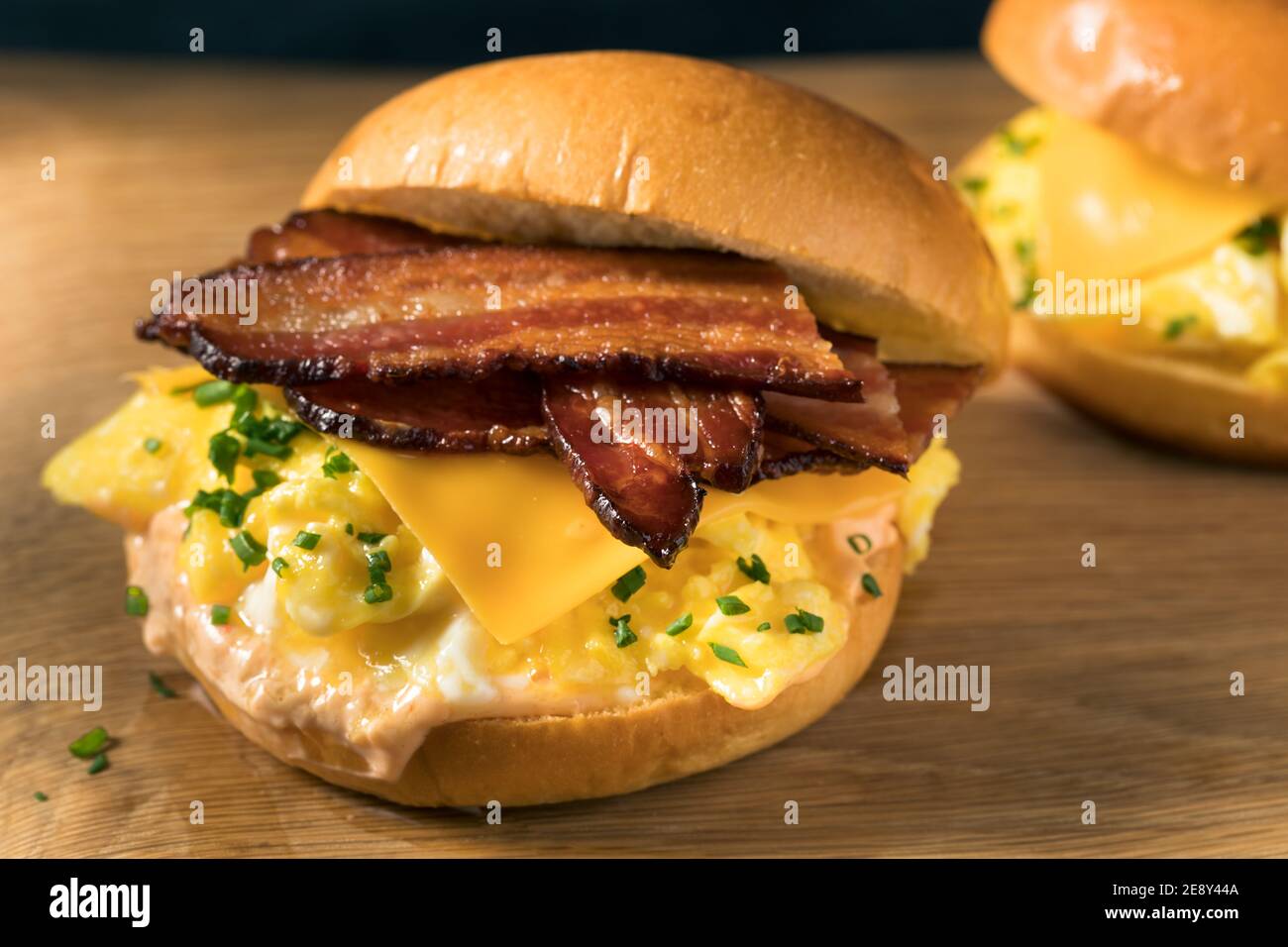 Homemade Bacon Egg Sandwich on a Brioche Bun with Cheese Stock Photo ...