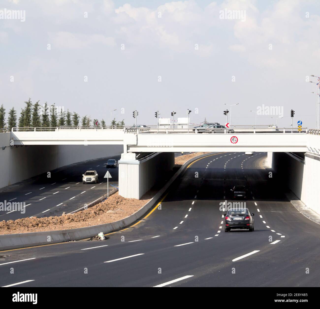 Highway interchange with bridge on the background Stock Photo - Alamy