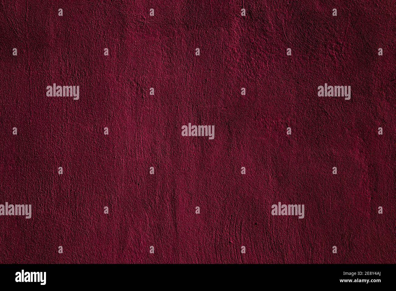Crimson colored wall background with textures of different shades of ...