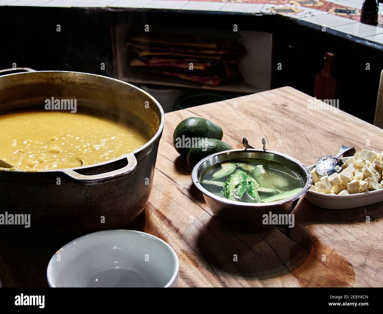 Traditional ecuadorian locro soup with cheese and avocado, zapallo ...