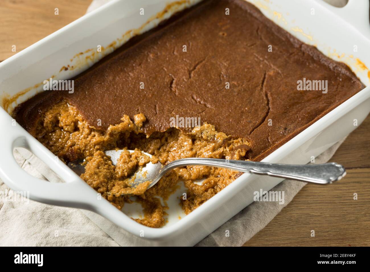 Homemade Cornmeal Indian Bread Pudding with Ice Cream Stock Photo - Alamy