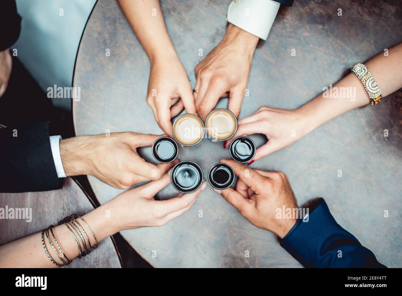 Hands toasting shots hi-res stock photography and images - Alamy