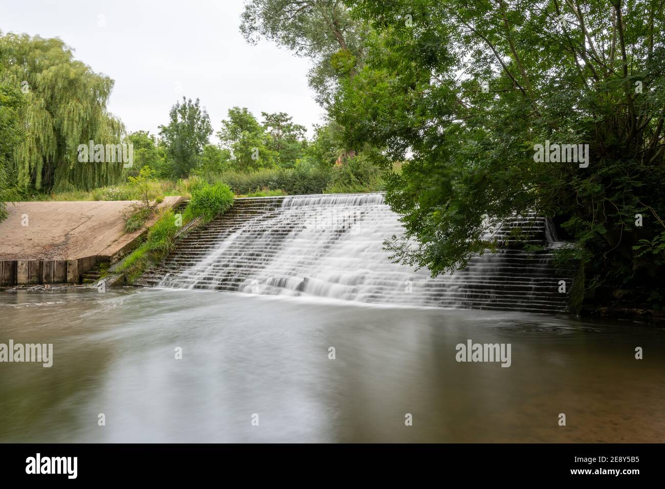 Long exposure of the River Brue flowing through the weir at West ...