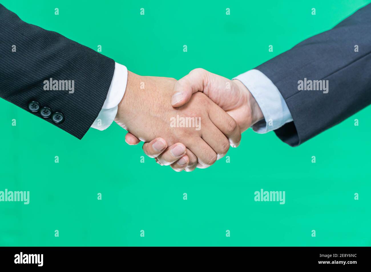 Business handshake on green screen background, partnership trust ...