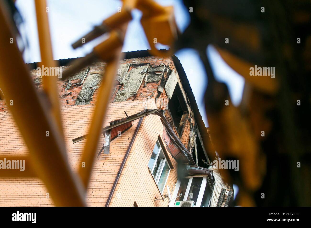 The aftermath of the fire on the top floor of the building. The ...