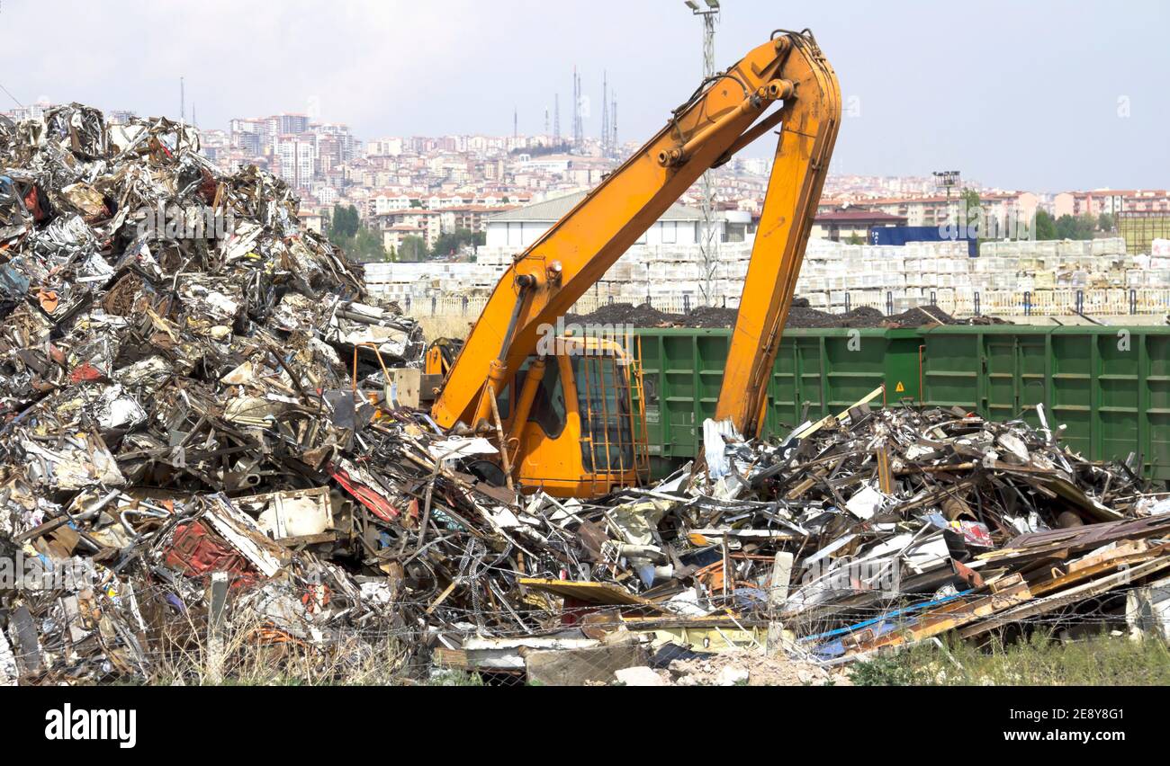 Scrap metal recycling plant and crane-loading scrap in a train Stock ...