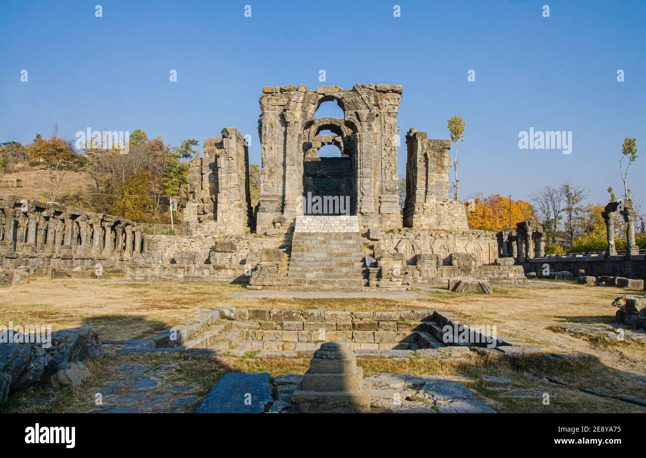 Ruins of the Martand Sun Temple under the sunlight and a blue sky in ...