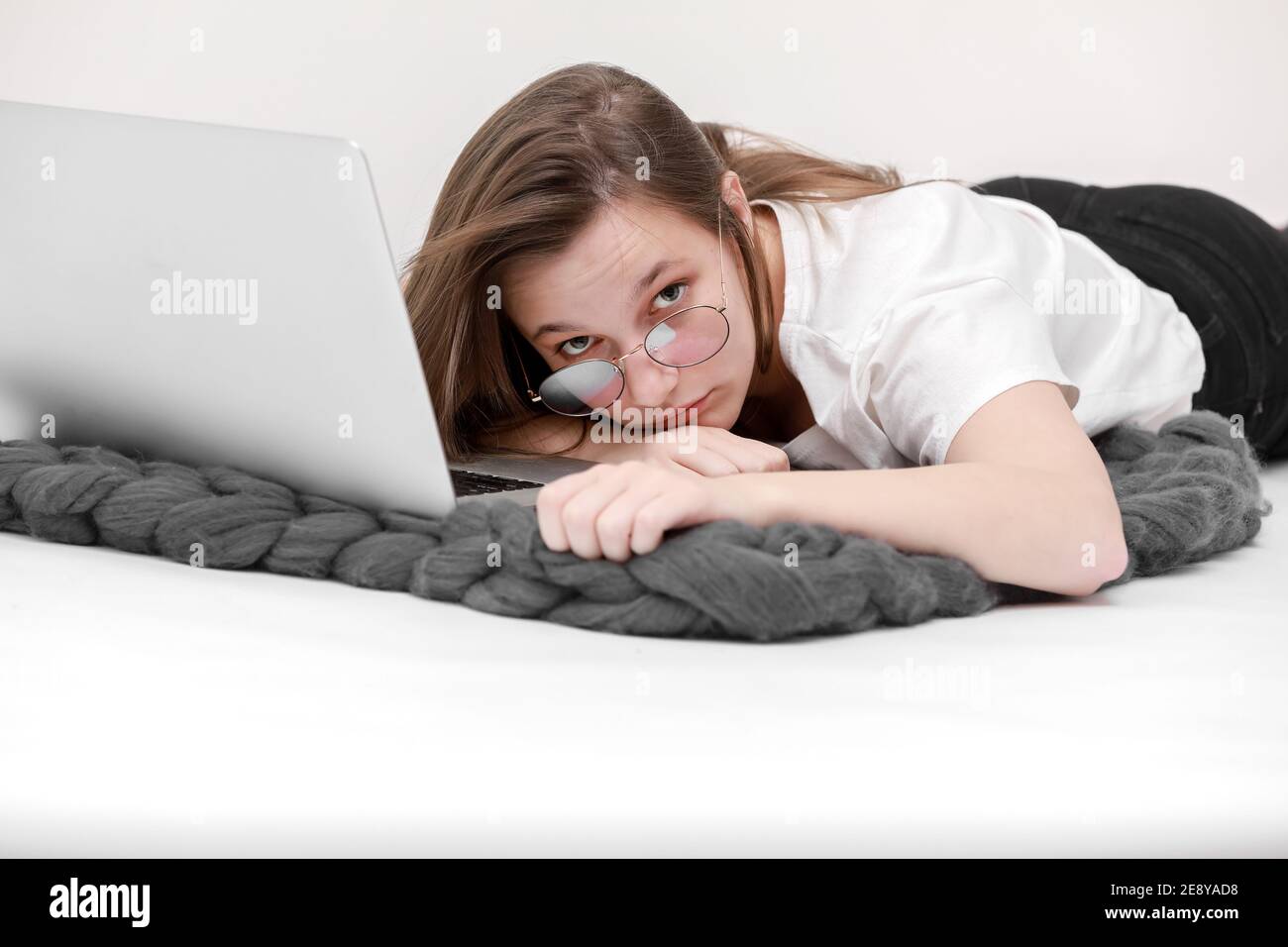 Girl falling asleep on computer hi-res stock photography and images - Alamy