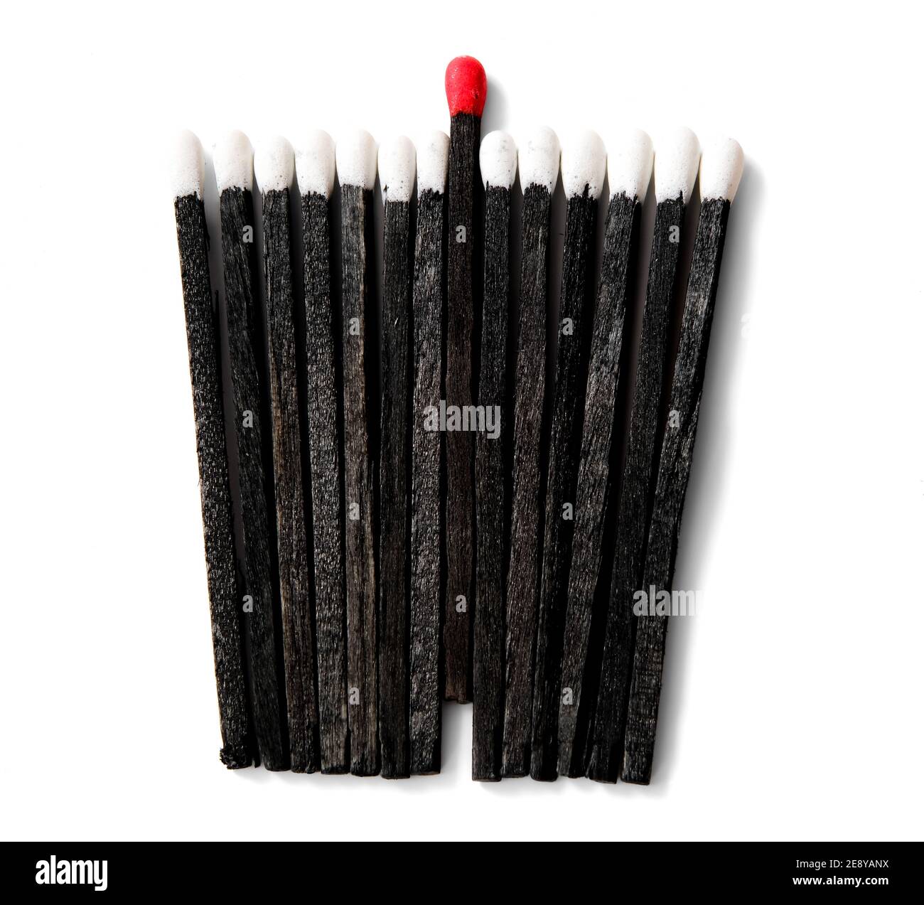 black matches with white heads and one with red head isolated over ...