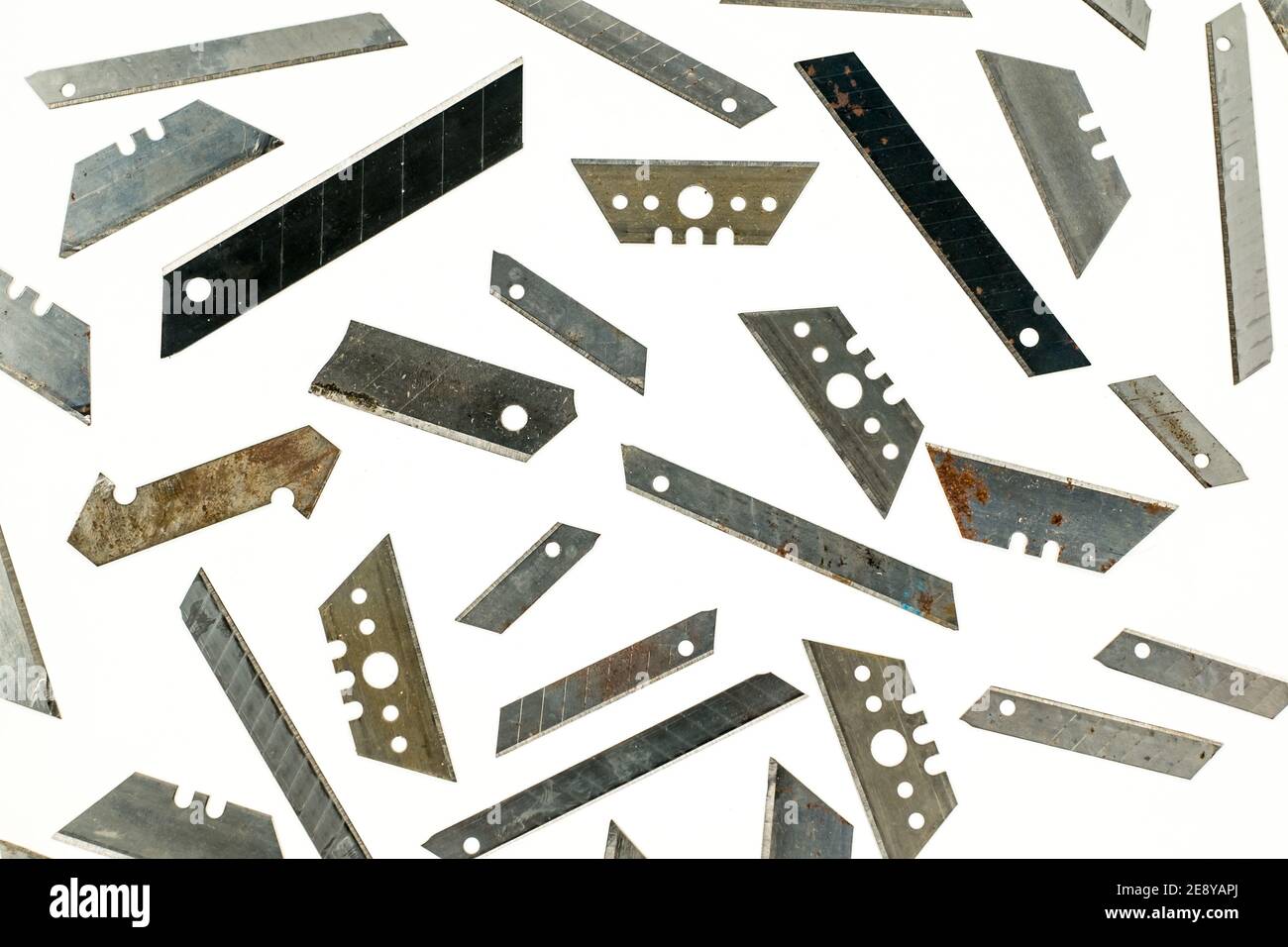old used rusty cutters blades on white background Stock Photo - Alamy