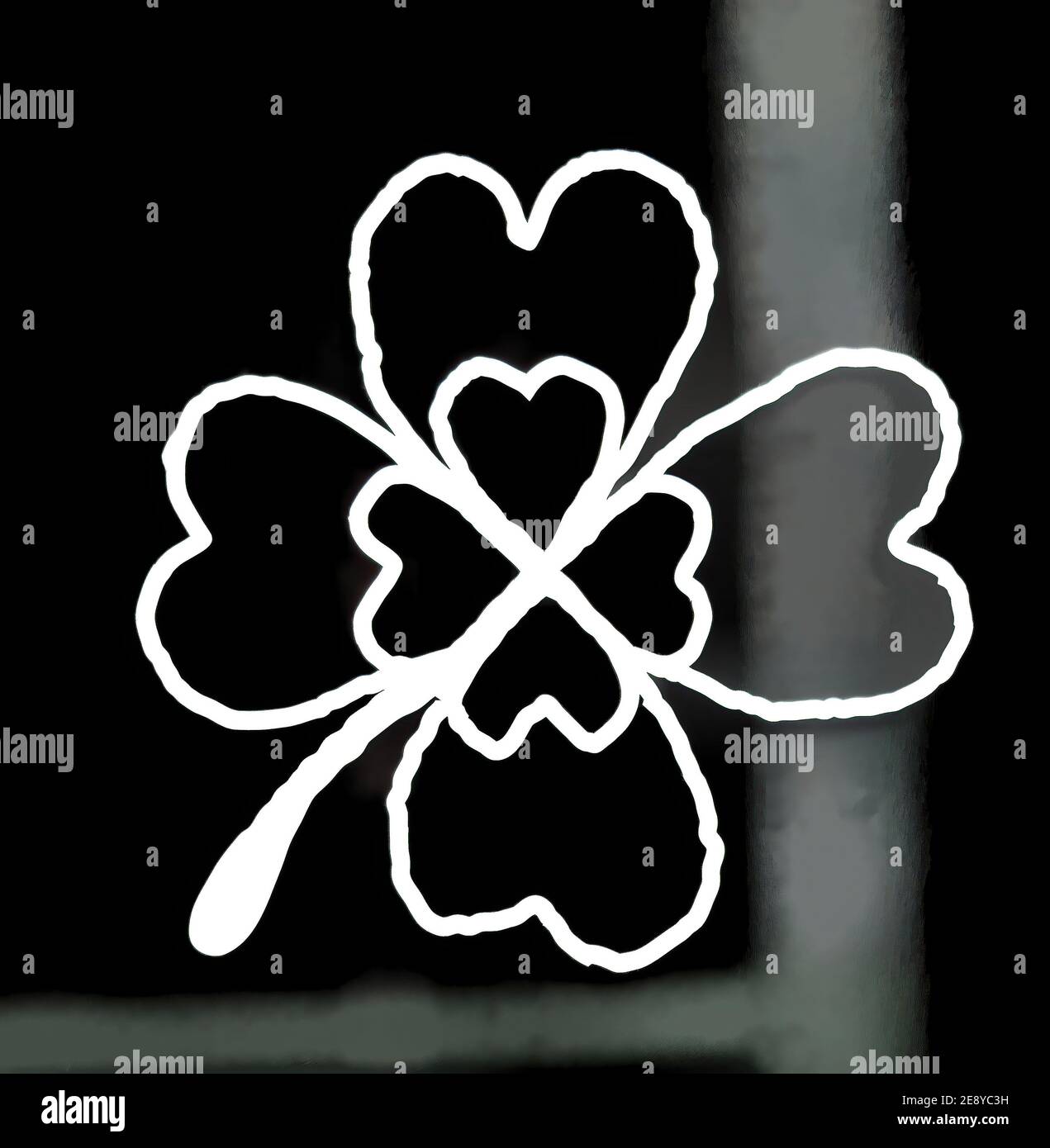 White outlines of a clover 4 on a glass window Stock Photo - Alamy