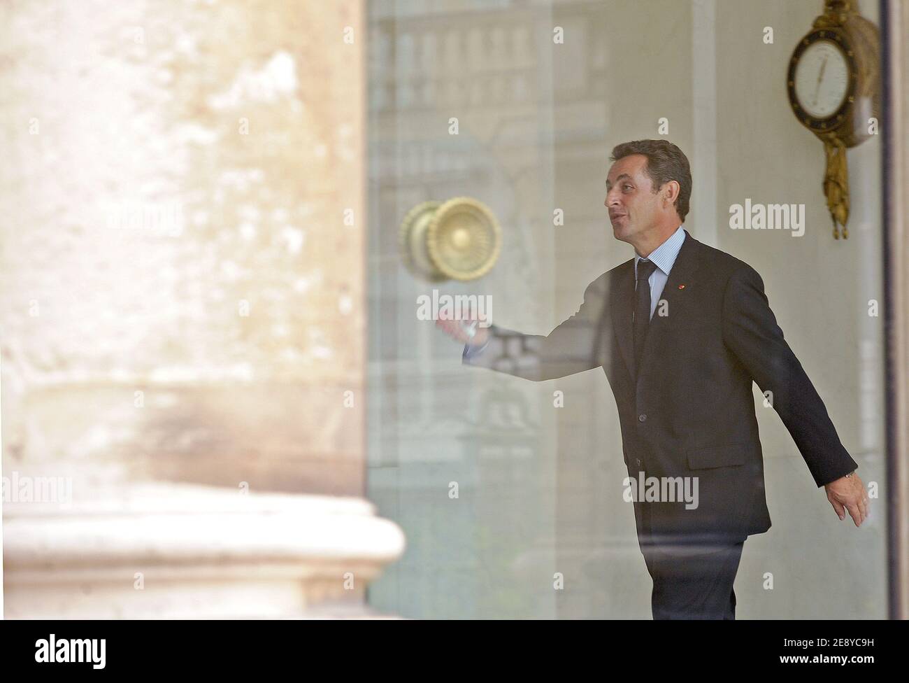 President Nicolas Sarkozy leaves the Elysee Palace in Paris, France on ...