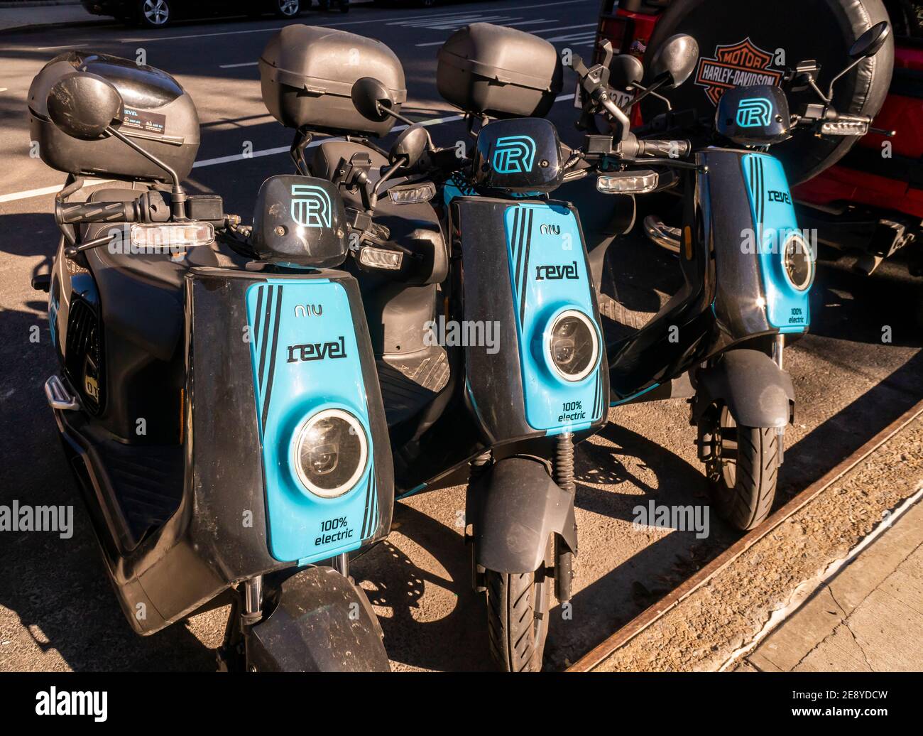 A trio of electric mopeds from the moped sharing company Revel parked ...