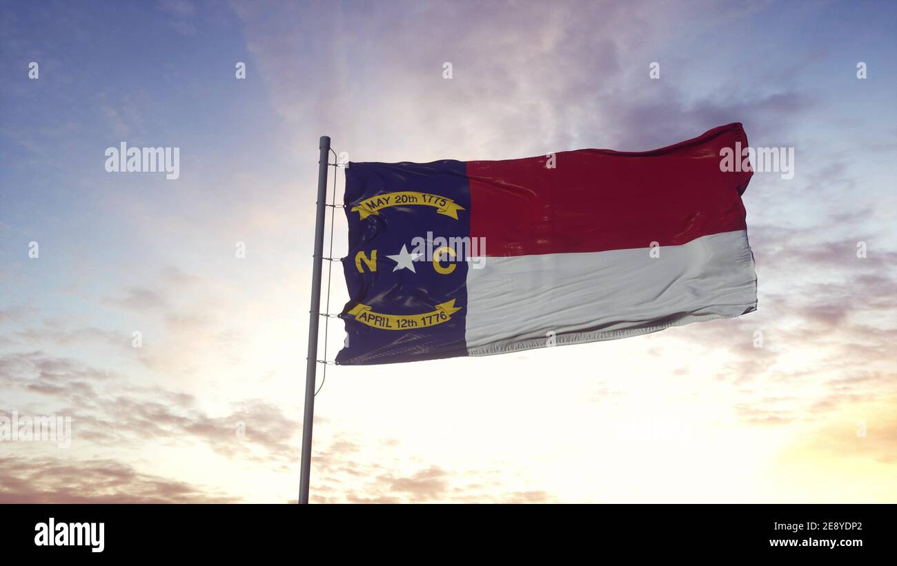 State flag of North Carolina waving in the wind. Dramatic sky ...