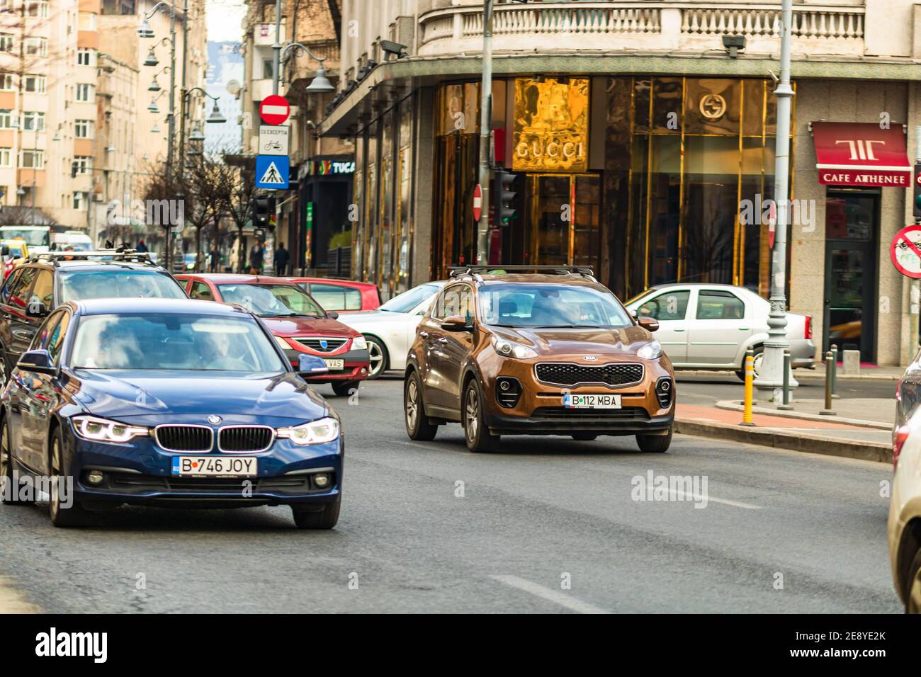 Car traffic at rush hour in downtown area of the city. Car pollution ...