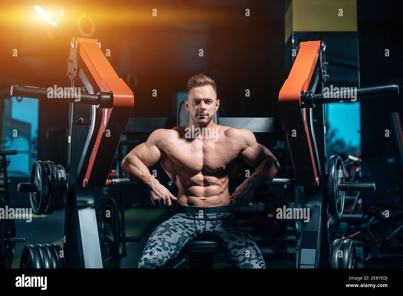 young sportsman bodybuilder with muscle body have workout in gym Stock ...