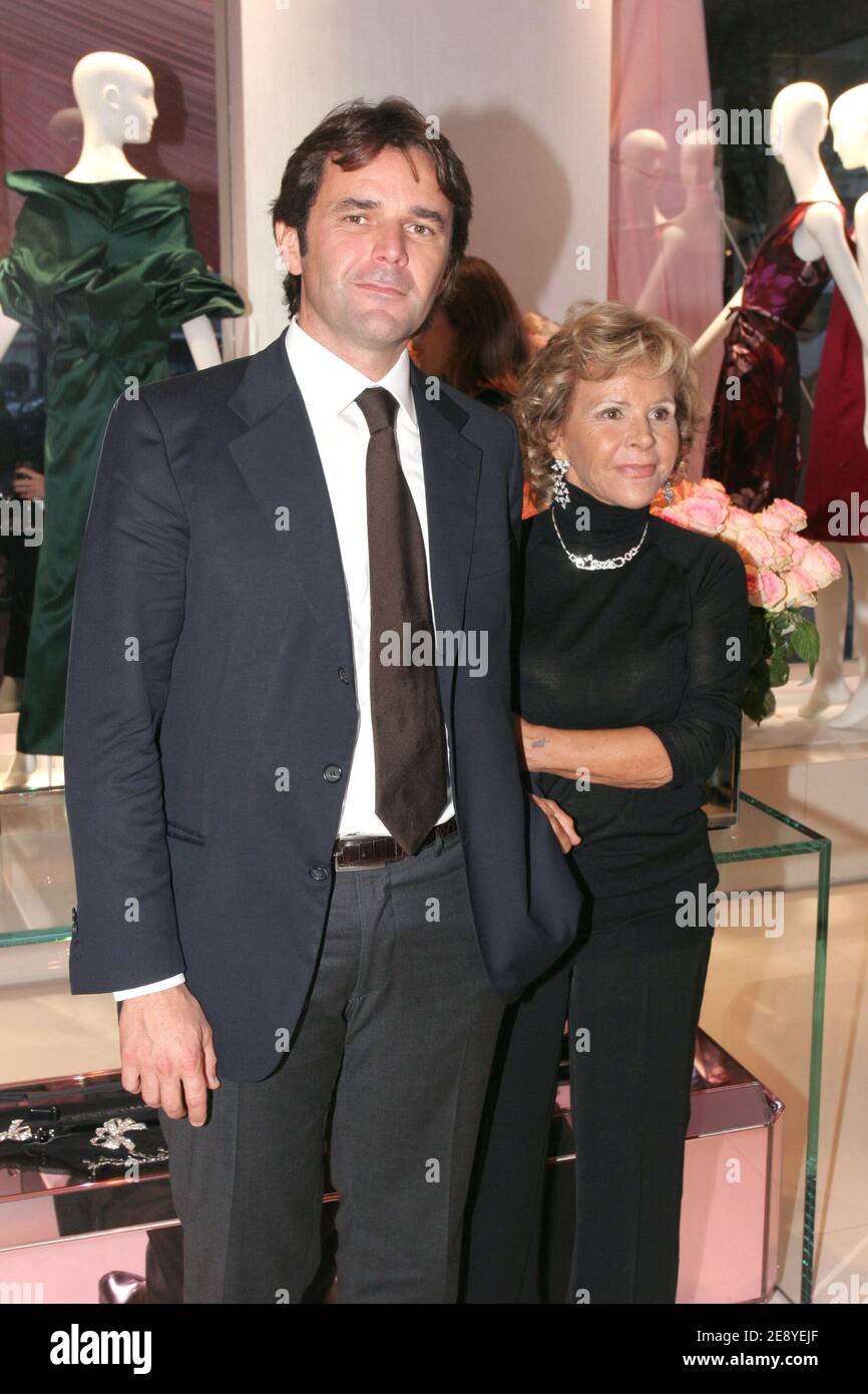 Italian Fashion Designer Anna Molinari poses with her son during the ...
