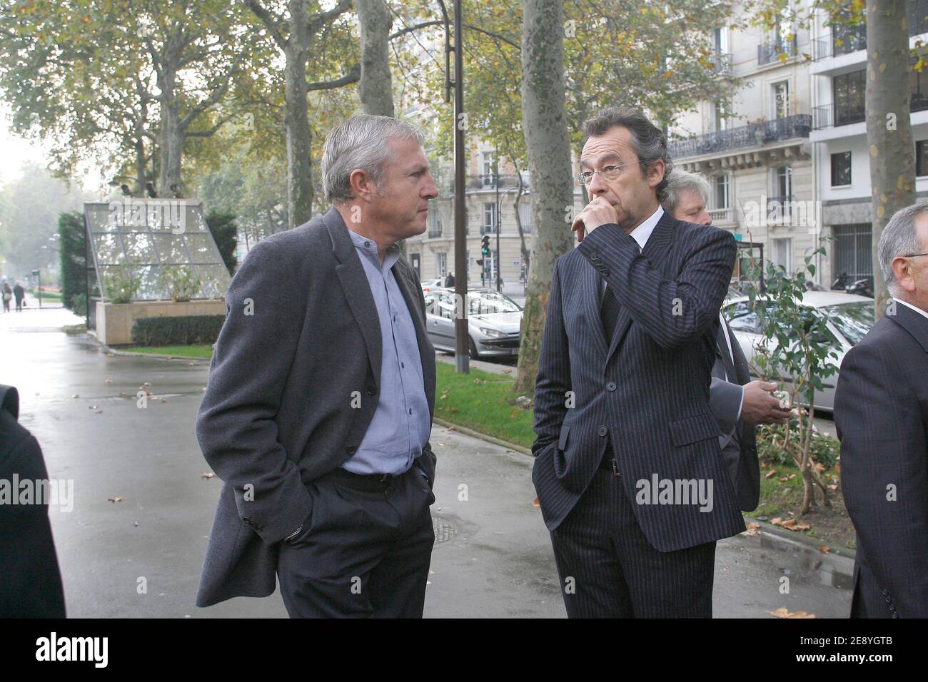 Coach Luis Fernandez and anchor Michel Denizot attend the funeral of ...
