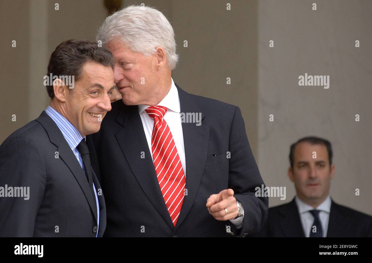 Former US President Bill Clinton is welcomed by French President ...