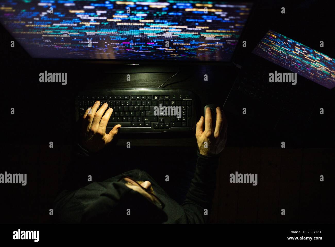 hacker coding at night cybersecurity concept Stock Photo - Alamy