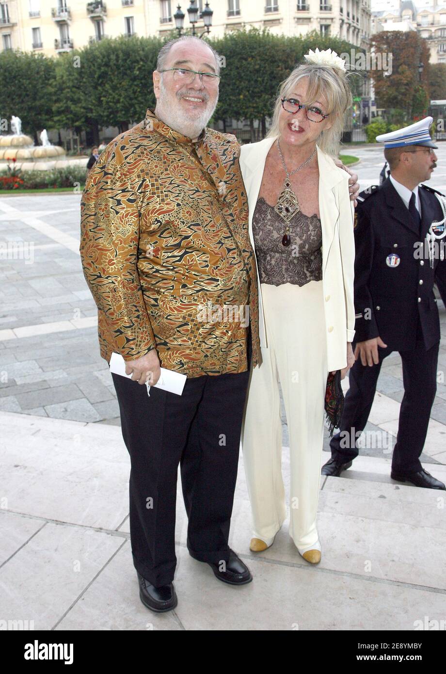French singer Carlos and his wife arrive to the wedding of Patrick ...