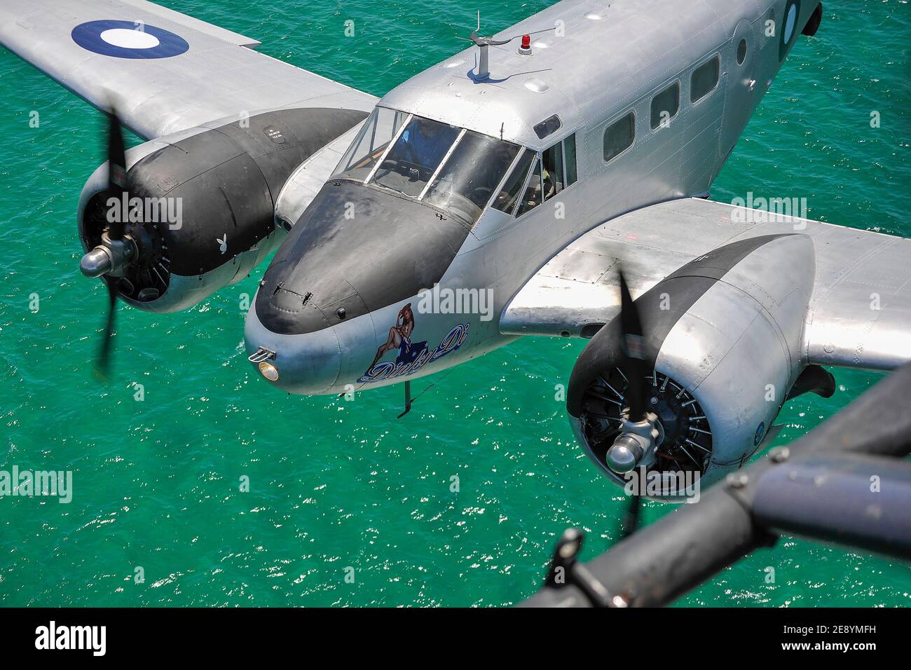 A restored World War Two Beech 18 Expeditor transport aircraft over a ...