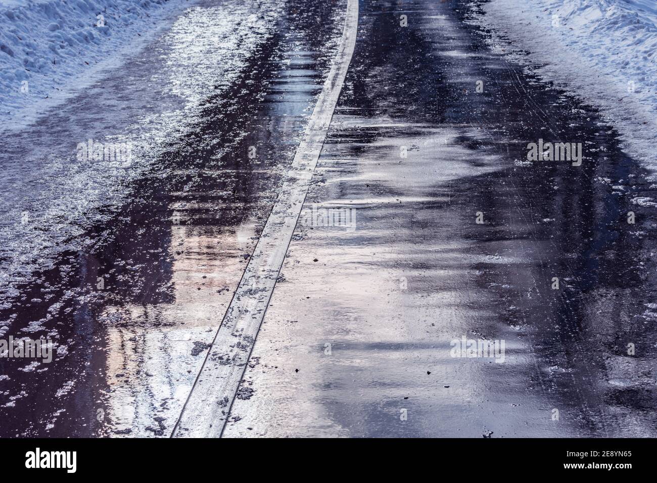 Wet asphalt road surface at winter morning Stock Photo - Alamy