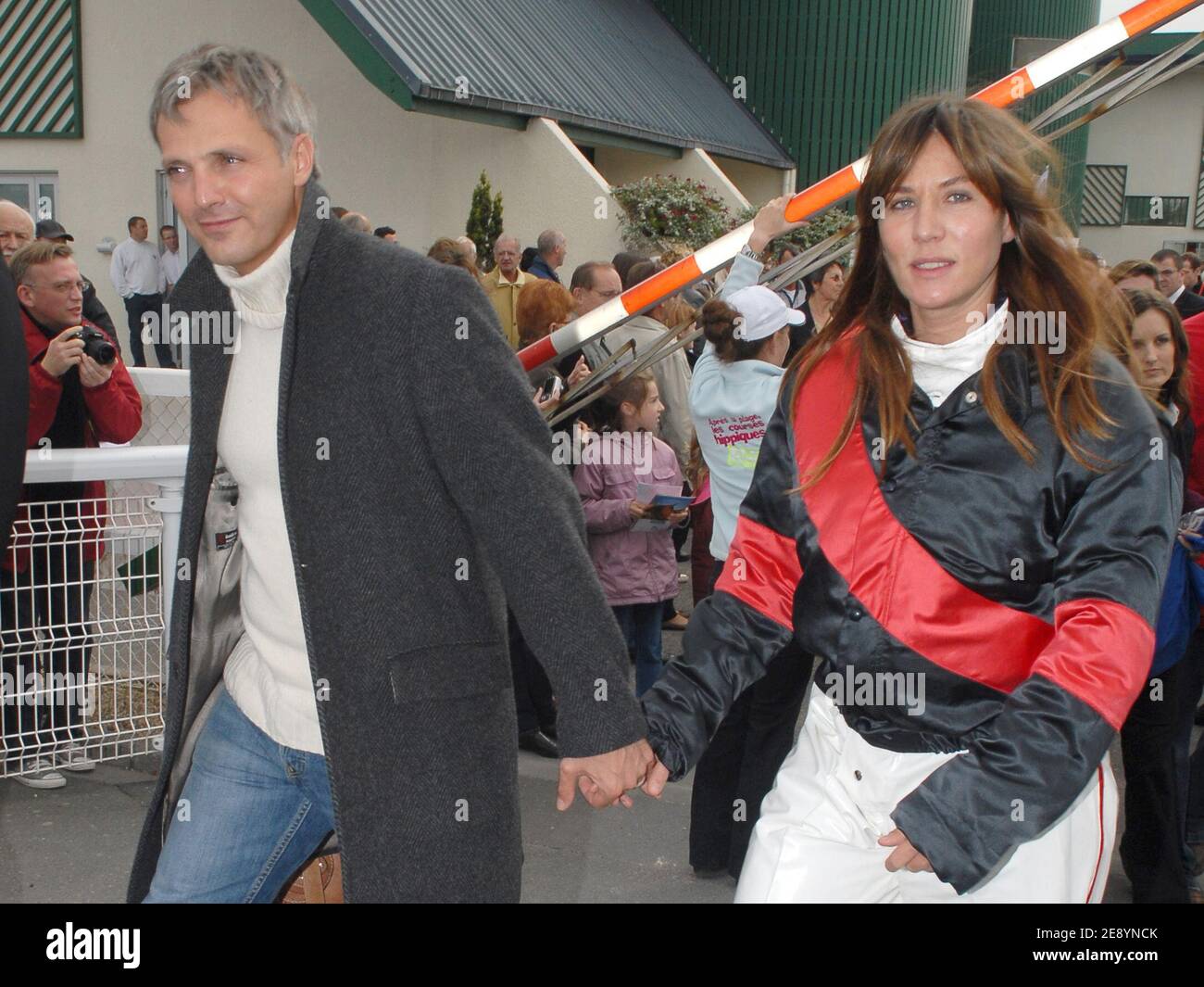 Actress Mathilde Seigner and her boyfriend Mathieu Petit attend the ...