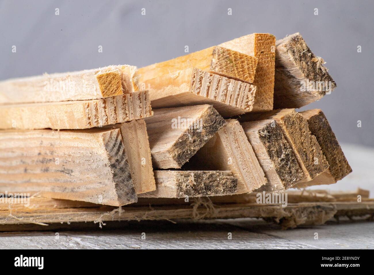 Stacked raw planks. Material for use in a carpentry workshop. Light ...