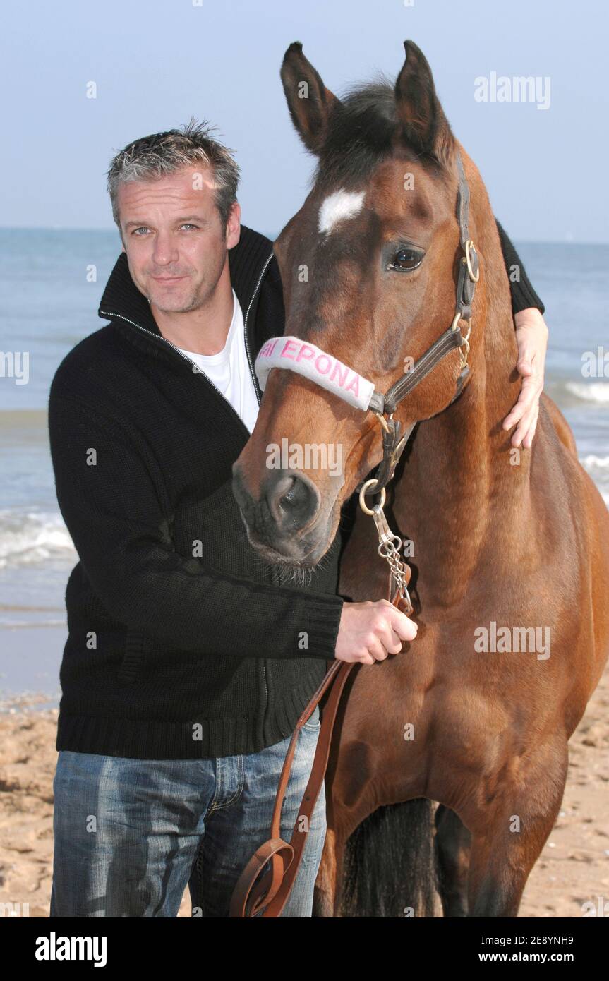 David Brecourt poses for pictures during a photocall at the 14th annual ...