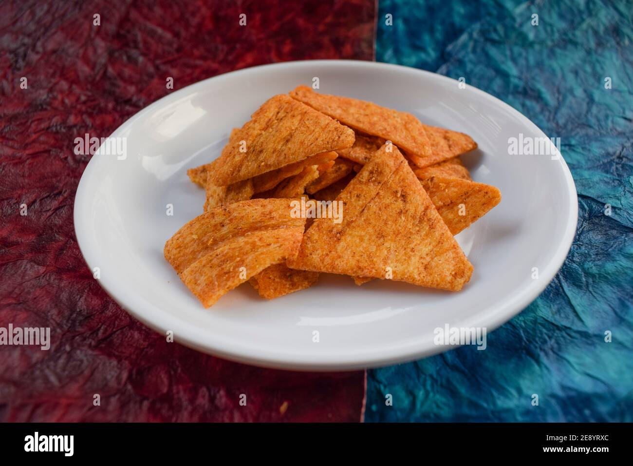 Crunchy tasty tea time snacks Nachos or Nacho chips Stock Photo - Alamy