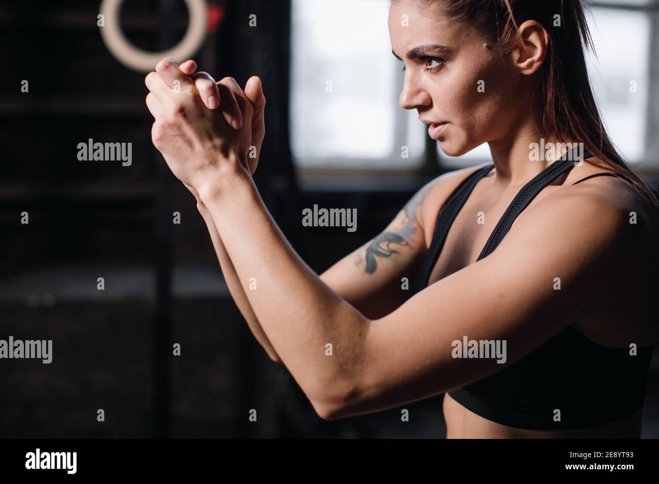 Young girl doing sports in the gym. Atmospheric gym Stock Photo - Alamy